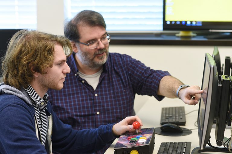 Student's Retro Fighting Game Knocks 'Em Out on Research Day